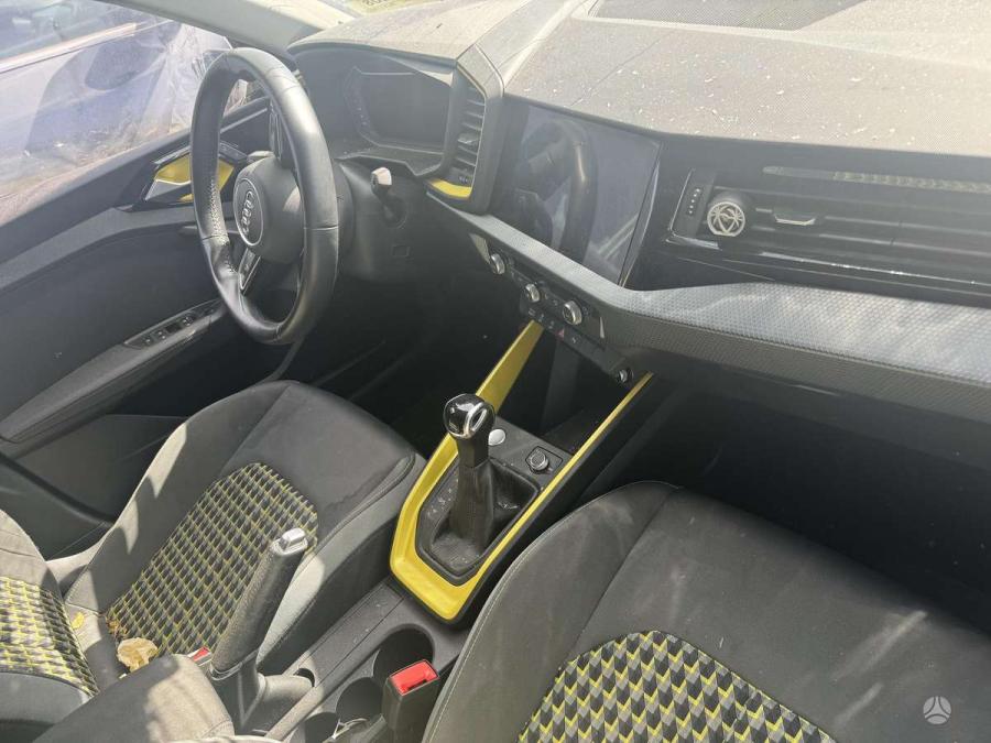 Yellow Audi A1 2018 in Taurage, with an engine capacity of 1.00 L and mileage of 104 thousand km for 6900 €, photo 8 on AUTOMOTO.COM.LV