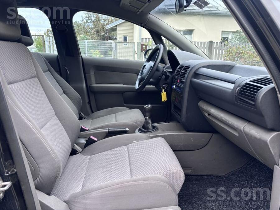Black Audi A2 2001 in Riga, with an engine capacity of 1.40 L and mileage of 231 thousand km for 2990 €, photo 14 on AUTOMOTO.COM.LV
