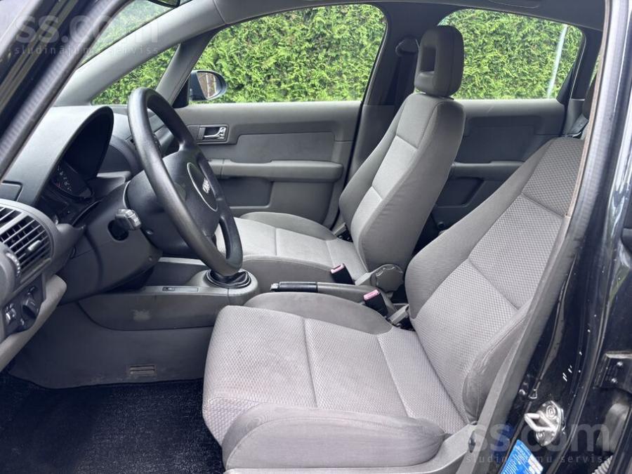 Black Audi A2 2001 in Riga, with an engine capacity of 1.40 L and mileage of 231 thousand km for 2990 €, photo 15 on AUTOMOTO.COM.LV