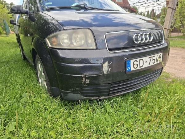 Melns Audi A2 2001 Daugavpils, ar dzinēja tilpumu 1.40 L un nobraukumu 433 tūkst. km par 1000 €, foto 3 vietnē AUTOMOTO.COM.LV