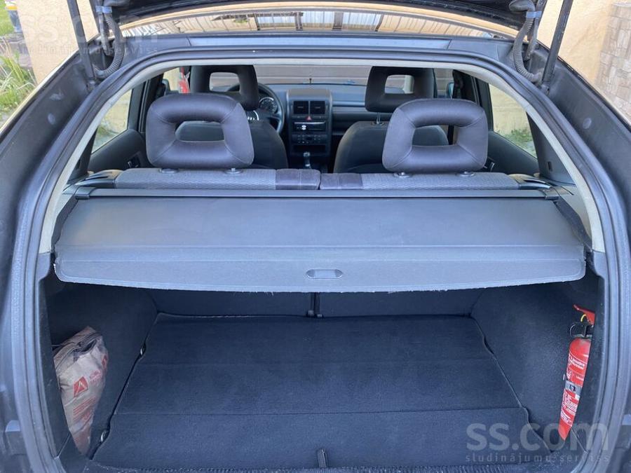 Black Audi A2 2003 in Riga, with an engine capacity of 1.40 L and mileage of 250 thousand km for 2850 €, photo 12 on AUTOMOTO.COM.LV
