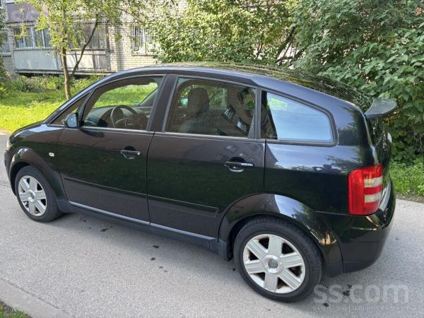 Black Audi A2 2004 in Riga, with an engine capacity of 1.40 L and mileage of 309 thousand km for 2990 €, photo 7 on AUTOMOTO.COM.LV