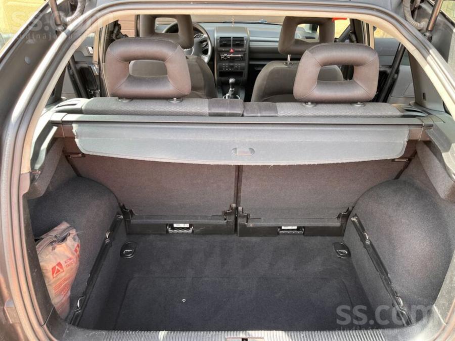 Black Audi A2 2003 in Riga, with an engine capacity of 1.40 L and mileage of 247 thousand km for 2900 €, photo 16 on AUTOMOTO.COM.LV