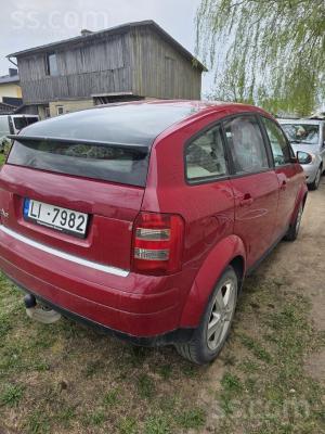 Sarkans Audi A2 2003 Valmiera, ar dzinēja tilpumu 1.40 L un nobraukumu 299 tūkst. km par 1450 €, foto 5 vietnē AUTOMOTO.COM.LV