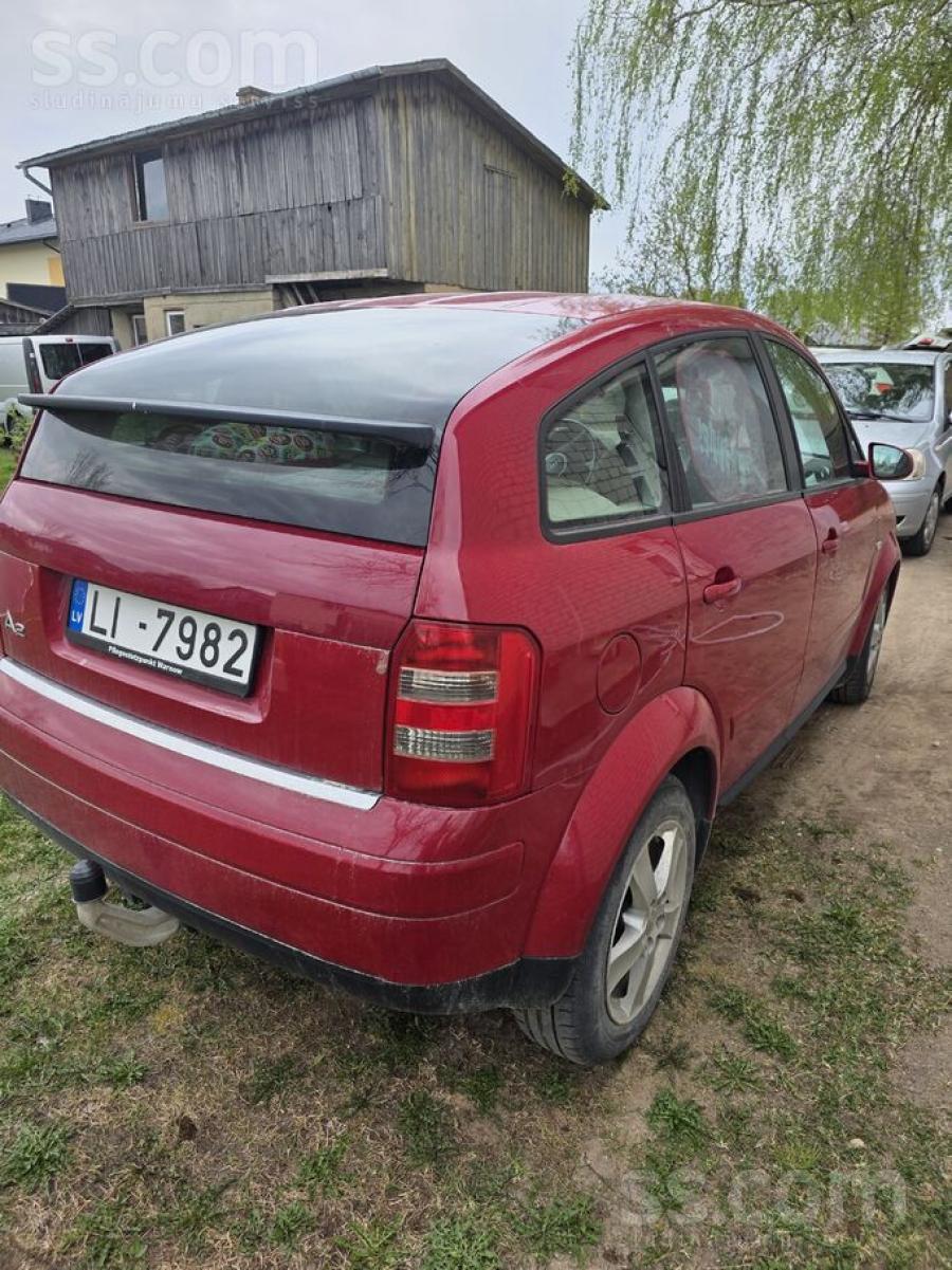 Sarkans Audi A2 2003 Valmiera, ar dzinēja tilpumu 1.40 L un nobraukumu 299 tūkst. km par 1450 €, foto 5 vietnē AUTOMOTO.COM.LV