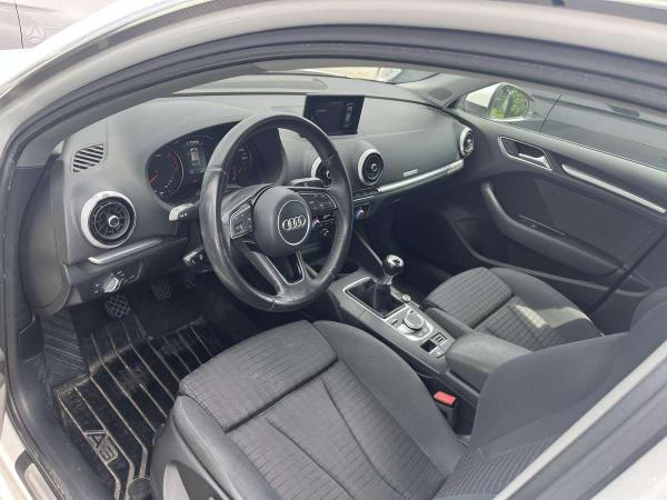 White Audi A3 2017 in Panevezys, with an engine capacity of 1.60 L and mileage of 235 thousand km for 9500 €, photo 6 on AUTOMOTO.COM.LV