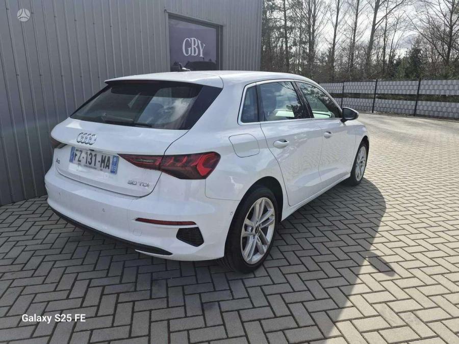White Audi A3 2021 in Taurage, with an engine capacity of 2.00 L and mileage of 266 thousand km for 16940 €, photo 6 on AUTOMOTO.COM.LV