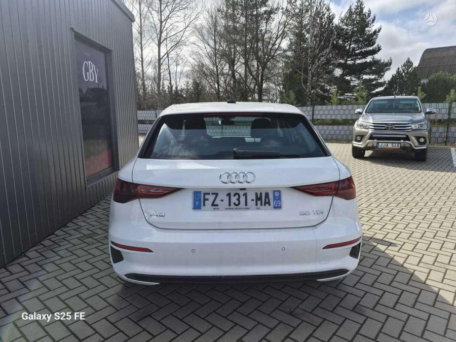 White Audi A3 2021 in Taurage, with an engine capacity of 2.00 L and mileage of 266 thousand km for 16940 €, photo 7 on AUTOMOTO.COM.LV