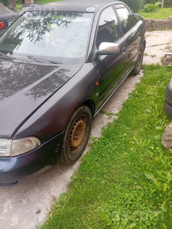 Black Audi A4 1996 in Saldus, with an engine capacity of 1.80 L and mileage of 394 thousand km for 450 €, photo 8 on AUTOMOTO.COM.LV