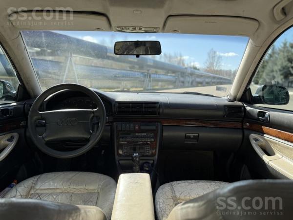 Black Audi A4 1997 in Riga, with an engine capacity of 1.80 L and mileage of 305 thousand km for 900 €, photo 2 on AUTOMOTO.COM.LV