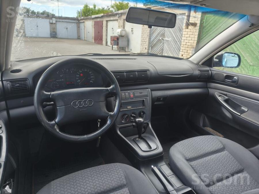 Black Audi A4 1997 in Riga, with an engine capacity of 1.60 L and mileage of 217 thousand km for 750 €, photo 1 on AUTOMOTO.COM.LV