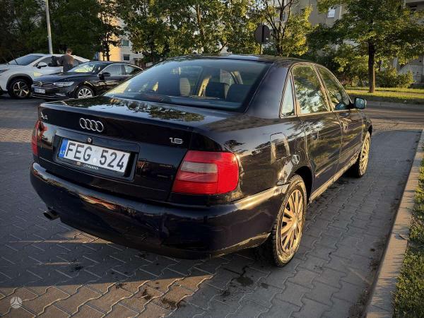 Black Audi A4 1997 in Vilnius, with an engine capacity of 1.60 L and mileage of 292 thousand km for 390 €, photo 6 on AUTOMOTO.COM.LV