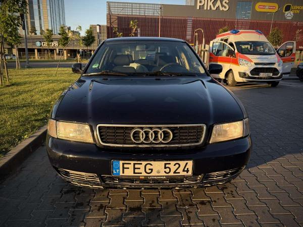 Black Audi A4 1997 in Vilnius, with an engine capacity of 1.60 L and mileage of 292 thousand km for 390 €, photo 9 on AUTOMOTO.COM.LV