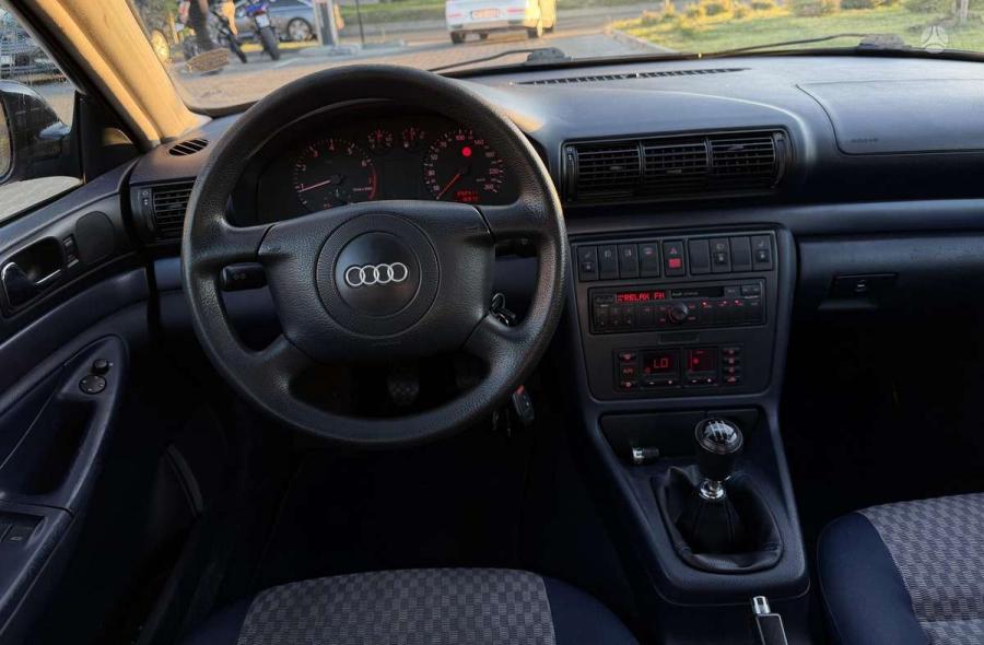 Black Audi A4 1997 in Vilnius, with an engine capacity of 1.60 L and mileage of 292 thousand km for 390 €, photo 12 on AUTOMOTO.COM.LV