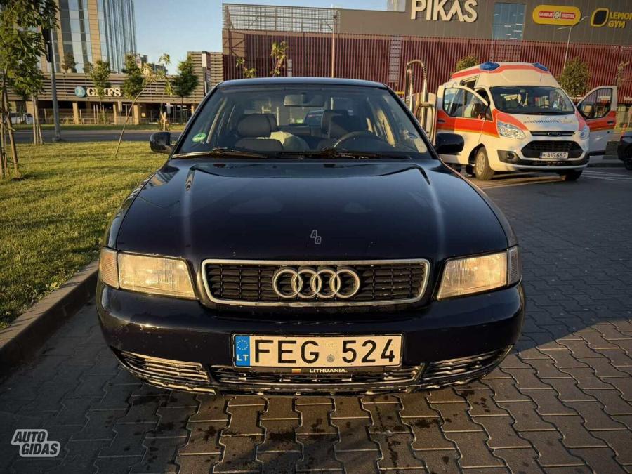 Black Audi A4 1997 in Vilnius, with an engine capacity of 1.60 L and mileage of 292 thousand km for 390 €, photo 4 on AUTOMOTO.COM.LV