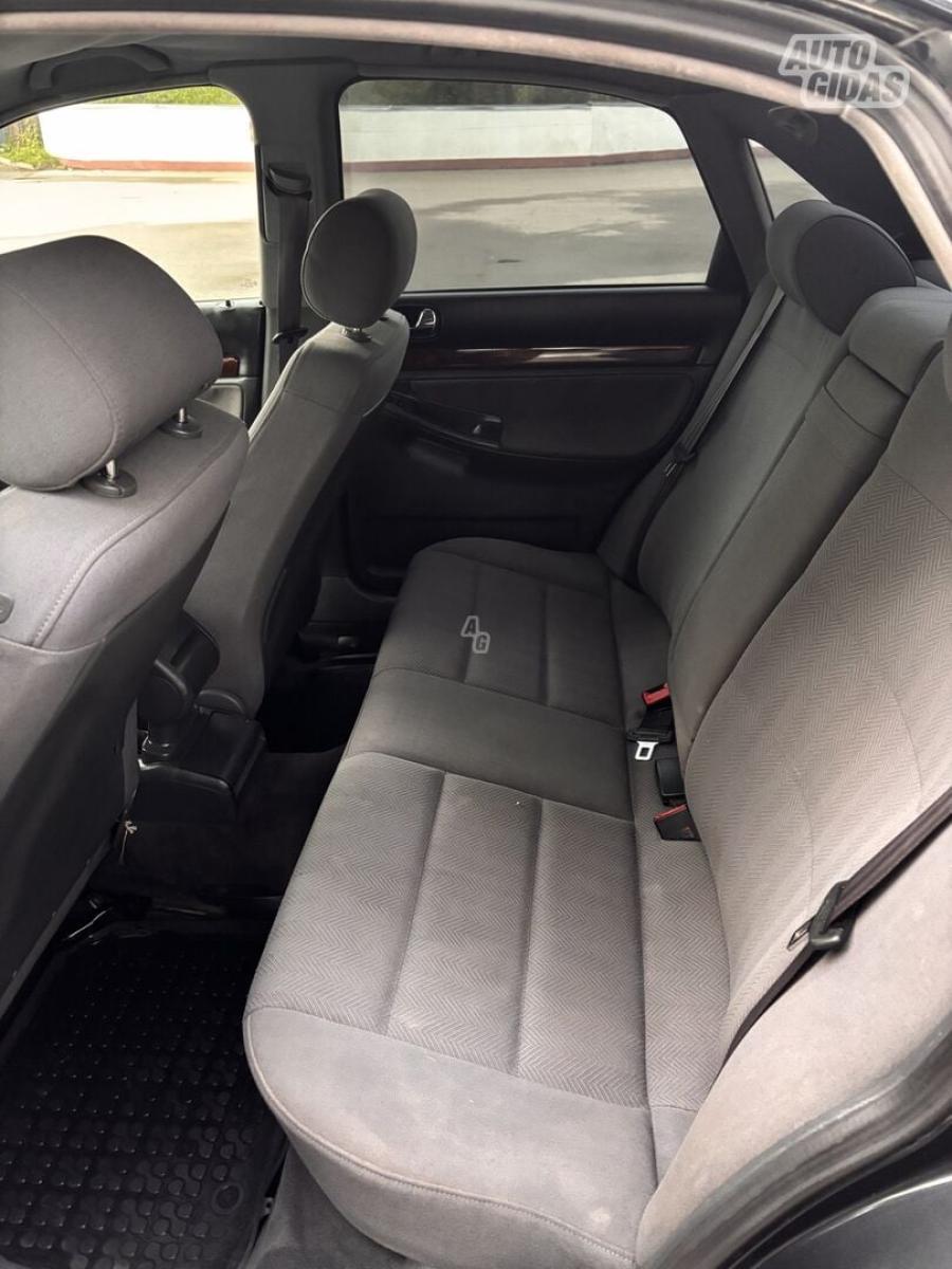 Black Audi A4 1999 in Vilnius, with an engine capacity of 1.90 L and mileage of 383 thousand km for 900 €, photo 15 on AUTOMOTO.COM.LV