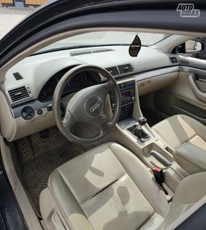 Melns Audi A4 2002 Panevēža, ar dzinēja tilpumu 1.80 L un nobraukumu 222 tūkst. km par 800 €, foto 8 vietnē AUTOMOTO.COM.LV