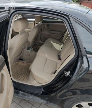Melns Audi A4 2002 Panevēža, ar dzinēja tilpumu 1.80 L un nobraukumu 222 tūkst. km par 800 €, foto 11 vietnē AUTOMOTO.COM.LV