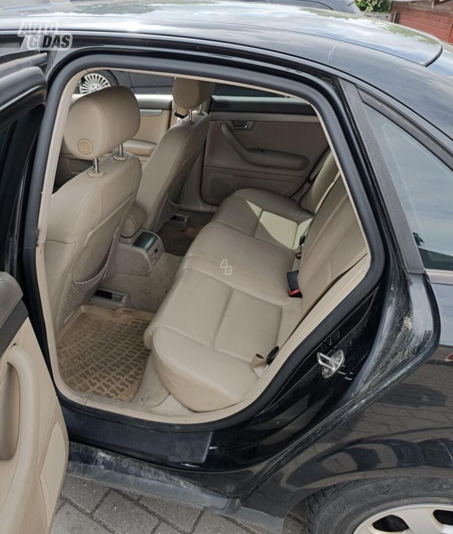 Melns Audi A4 2002 Panevēža, ar dzinēja tilpumu 1.80 L un nobraukumu 222 tūkst. km par 800 €, foto 11 vietnē AUTOMOTO.COM.LV