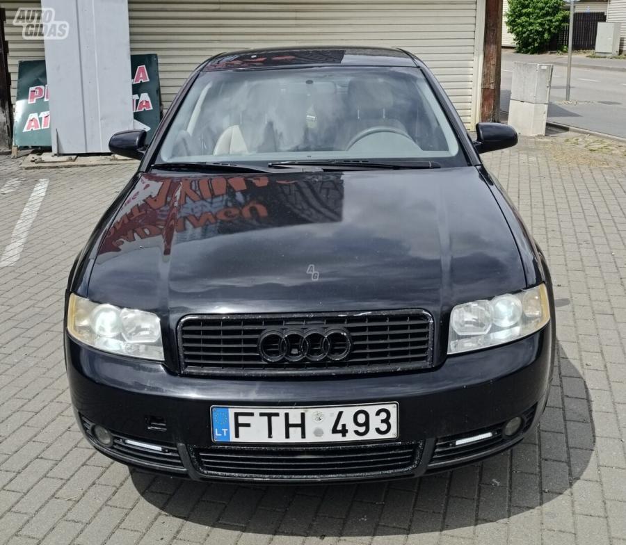 Melns Audi A4 2002 Panevēža, ar dzinēja tilpumu 1.80 L un nobraukumu 222 tūkst. km par 800 €, foto 13 vietnē AUTOMOTO.COM.LV