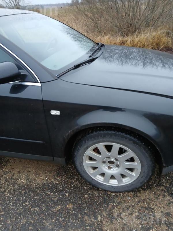 Melns Audi A4 2004 Kuldīga, ar dzinēja tilpumu 2.00 L un nobraukumu 305 tūkst. km par 1300 €, foto 5 vietnē AUTOMOTO.COM.LV