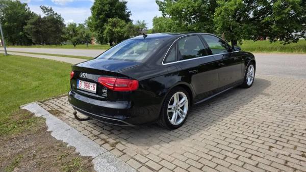 Black Audi A4 2016 in Riga, with an engine capacity of 2.00 L and mileage of 310 thousand km for 11950 €, photo 4 on AUTOMOTO.COM.LV