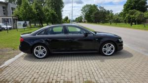 Black Audi A4 2016 in Riga, with an engine capacity of 2.00 L and mileage of 310 thousand km for 11950 €, photo 4 on AUTOMOTO.COM.LV