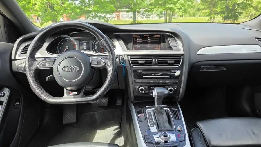 Black Audi A4 2016 in Riga, with an engine capacity of 2.00 L and mileage of 310 thousand km for 11950 €, photo 15 on AUTOMOTO.COM.LV