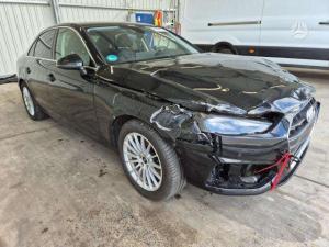 Black Audi A4 2023 in Vilnius, with an engine capacity of 2.00 L and mileage of 60 thousand km for 9500 €, photo  on AUTOMOTO.COM.LV