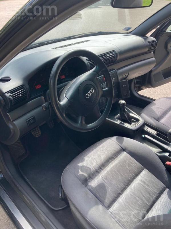 Black Audi A4 2000 in Riga, with an engine capacity of 1.80 L and mileage of 330 thousand km for 1300 €, photo 5 on AUTOMOTO.COM.LV