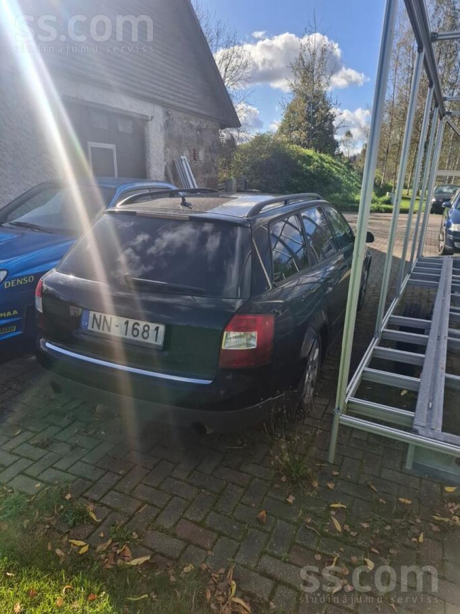 Black Audi A4 2003 in Riga, with an engine capacity of 1.80 L and mileage of 300 thousand km for 1000 €, photo 5 on AUTOMOTO.COM.LV