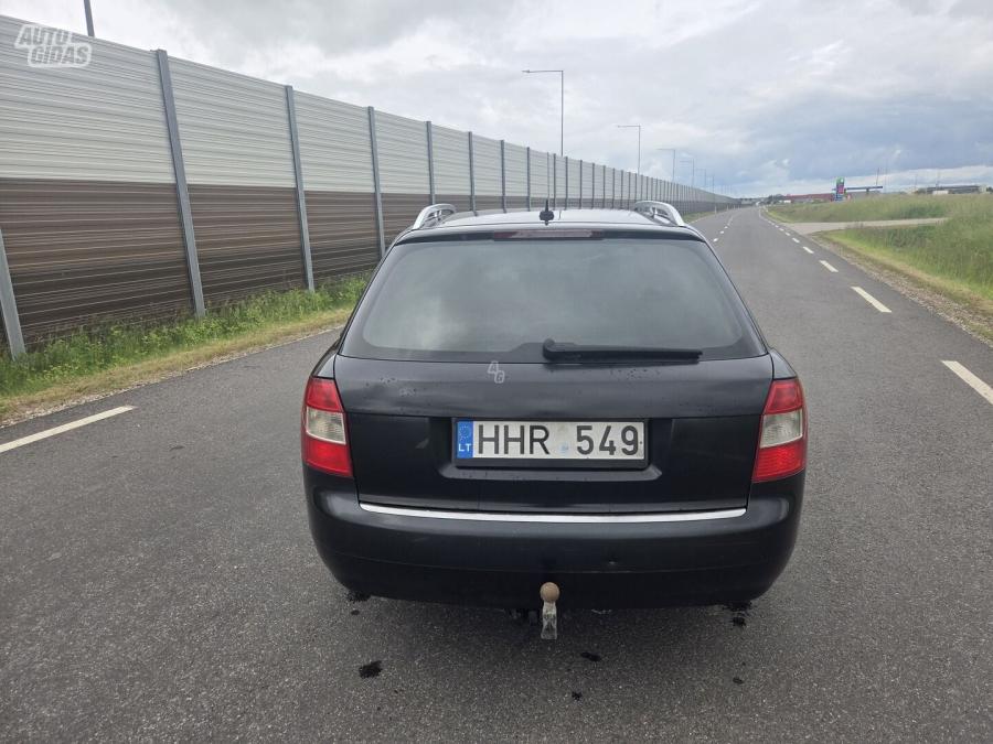 Black Audi A4 2004 in Kaunas, with an engine capacity of 2.50 L and mileage of 400 thousand km for 1199 €, photo 7 on AUTOMOTO.COM.LV
