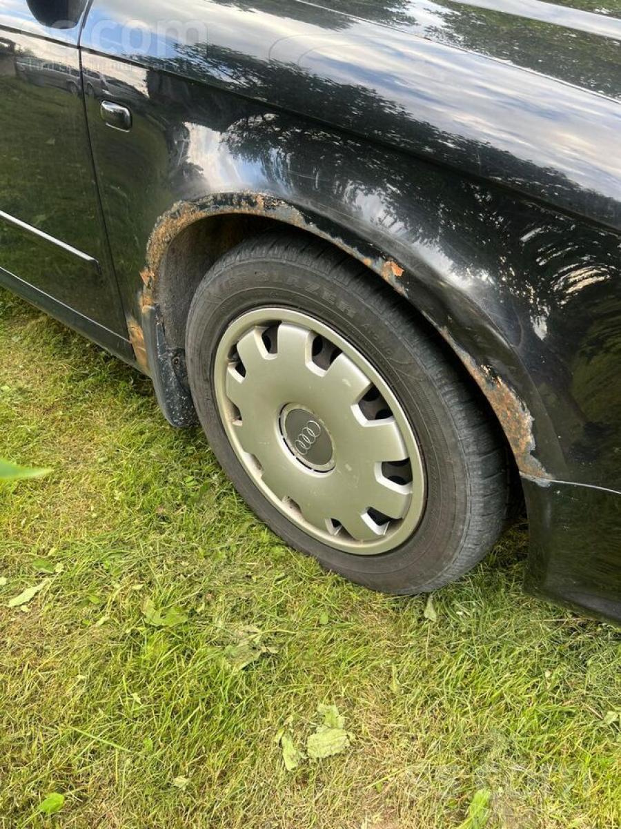 Black Audi A4 2006 in Riga, with an engine capacity of 2.00 L and mileage of 390 thousand km for 1950 €, photo 6 on AUTOMOTO.COM.LV