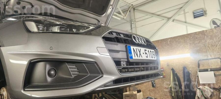 Brown Audi A4 2019 in Riga, with an engine capacity of 2.00 L and mileage of 145 thousand km for 16550 €, photo 13 on AUTOMOTO.COM.LV