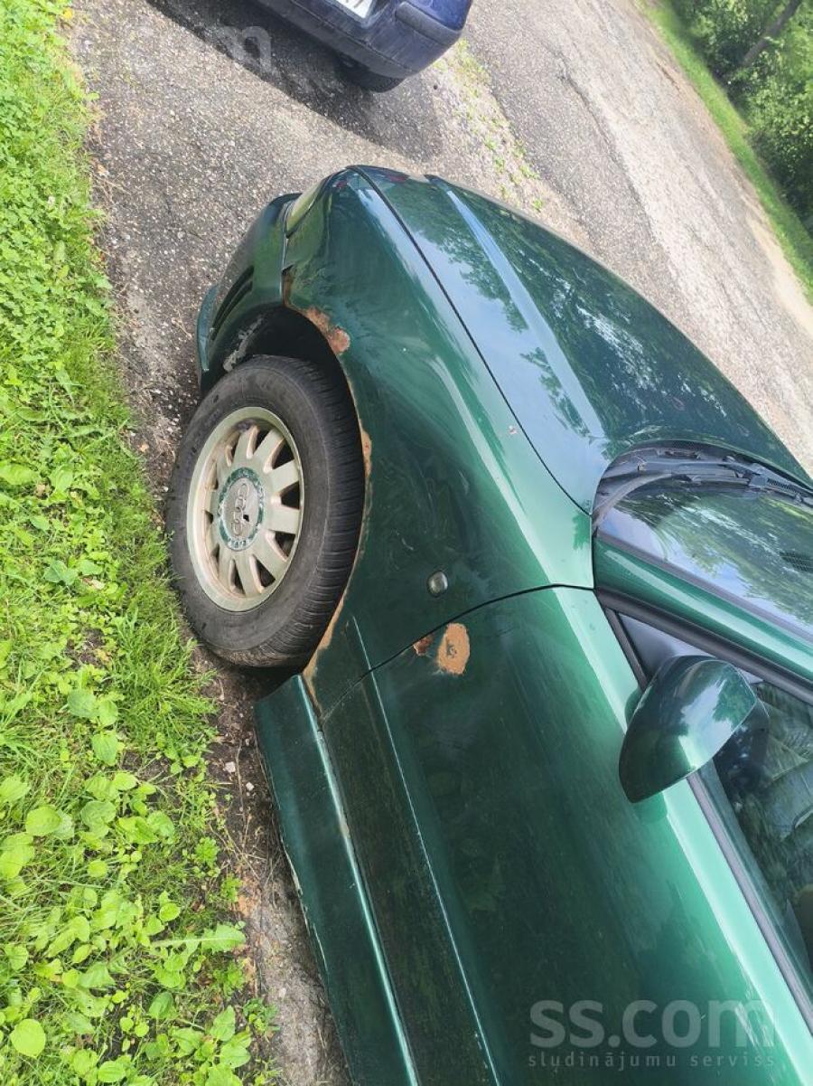 Green Audi A4 1999 in Riga, with an engine capacity of 1.80 L and mileage of 294 thousand km for 1000 €, photo 7 on AUTOMOTO.COM.LV