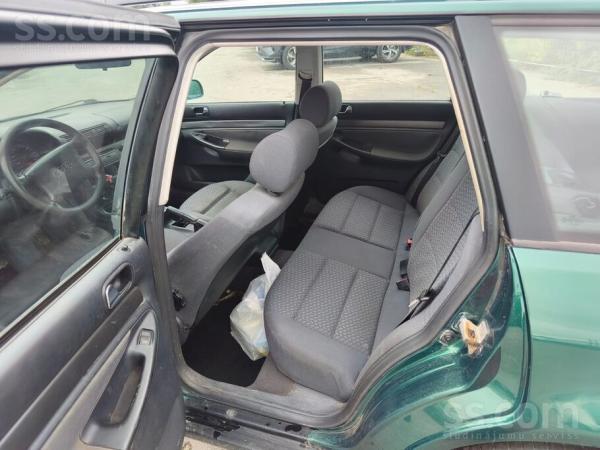 Green Audi A4 1996 in Riga, with an engine capacity of 1.80 L and mileage of 310 thousand km for 1400 €, photo 8 on AUTOMOTO.COM.LV