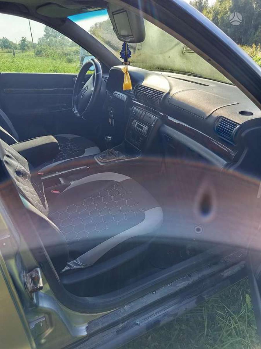 Grey Audi A4 1996 in Pakruojis, with an engine capacity of 1.60 L and mileage of 329 thousand km for 700 €, photo 10 on AUTOMOTO.COM.LV