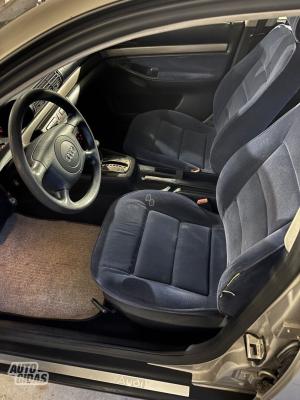 Pelēks Audi A4 1999 Joniškis, ar dzinēja tilpumu 1.80 L un nobraukumu 256 tūkst. km par 900 €, foto 13 vietnē AUTOMOTO.COM.LV