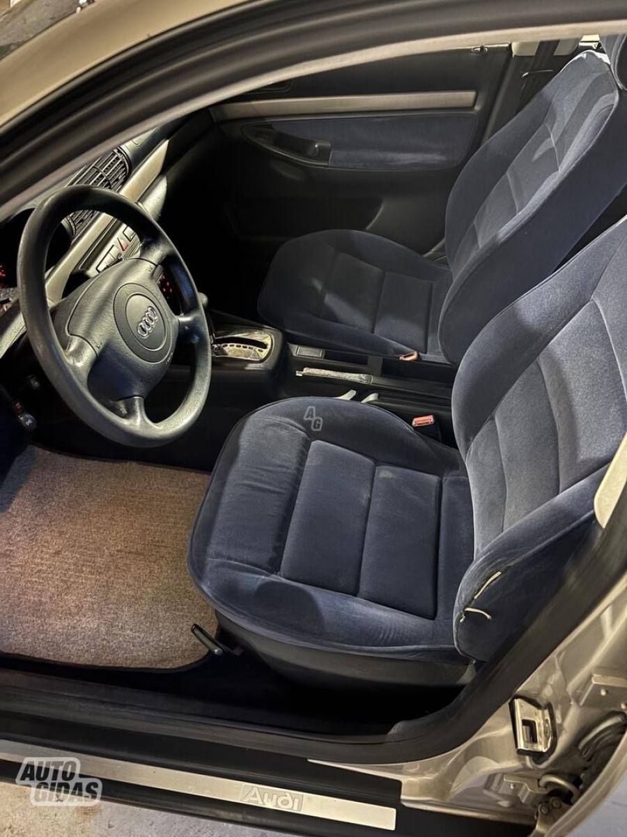 Pelēks Audi A4 1999 Joniškis, ar dzinēja tilpumu 1.80 L un nobraukumu 256 tūkst. km par 900 €, foto 13 vietnē AUTOMOTO.COM.LV