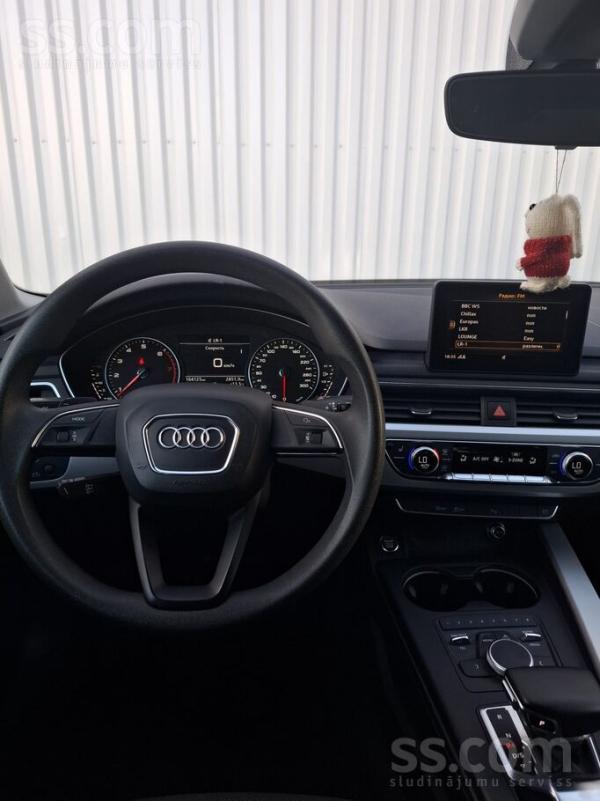 Audi A4 2017 in Riga on AUTOMOTO.COM.LV Grey Audi A4 2017 in Riga, with an engine capacity of 1.40 L and mileage of 164 thousand km for 15100 €, photo 6 on AUTOMOTO.COM.LV
