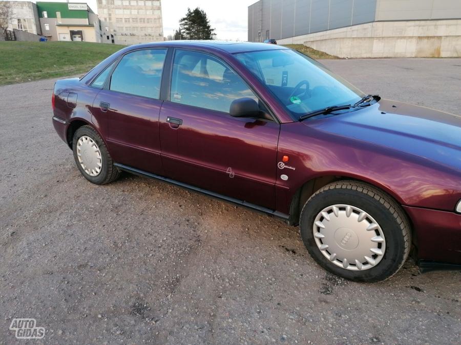 Red Audi A4 1995 in Utena, with an engine capacity of 1.80 L and mileage of 190 thousand km for 1000 €, photo 6 on AUTOMOTO.COM.LV