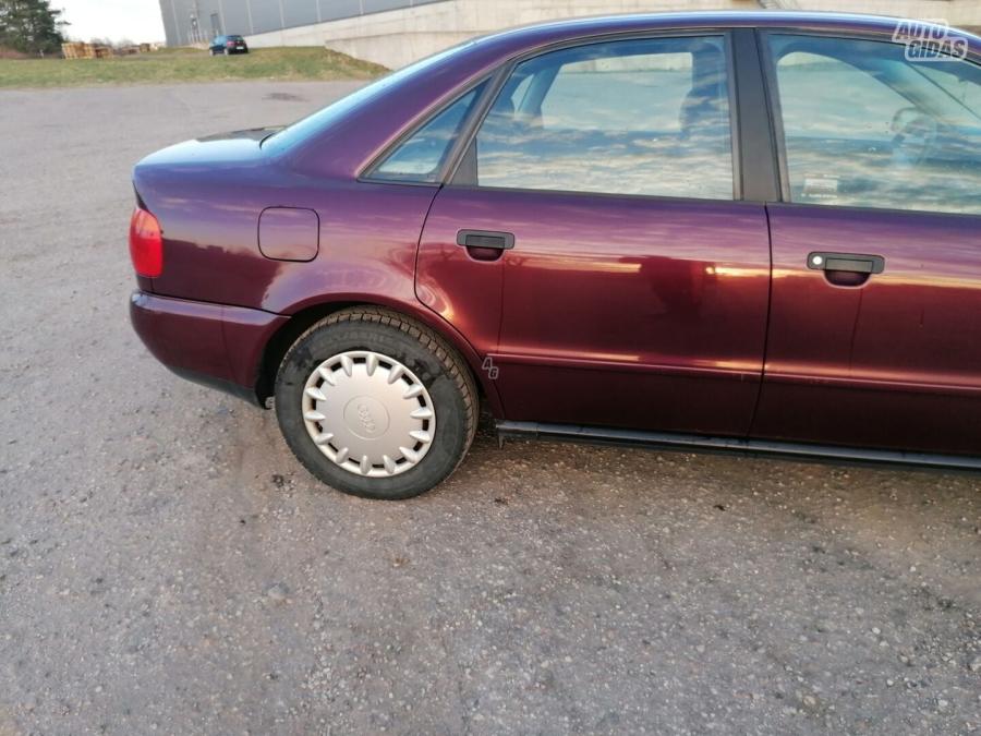 Red Audi A4 1995 in Utena, with an engine capacity of 1.80 L and mileage of 190 thousand km for 1000 €, photo 7 on AUTOMOTO.COM.LV