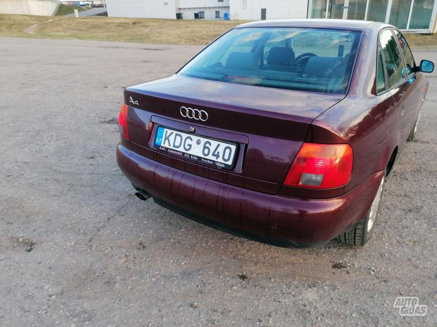 Red Audi A4 1995 in Utena, with an engine capacity of 1.80 L and mileage of 190 thousand km for 1000 €, photo 9 on AUTOMOTO.COM.LV