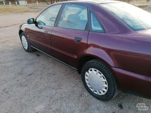 Red Audi A4 1995 in Utena, with an engine capacity of 1.80 L and mileage of 190 thousand km for 1000 €, photo 11 on AUTOMOTO.COM.LV