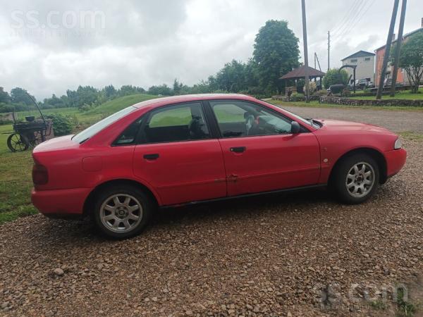 Red Audi A4 1995 in Valmiera, with an engine capacity of 1.60 L and mileage of 386 thousand km for 670 €, photo 3 on AUTOMOTO.COM.LV