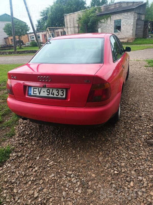 Red Audi A4 1995 in Valmiera, with an engine capacity of 1.60 L and mileage of 386 thousand km for 670 €, photo 5 on AUTOMOTO.COM.LV