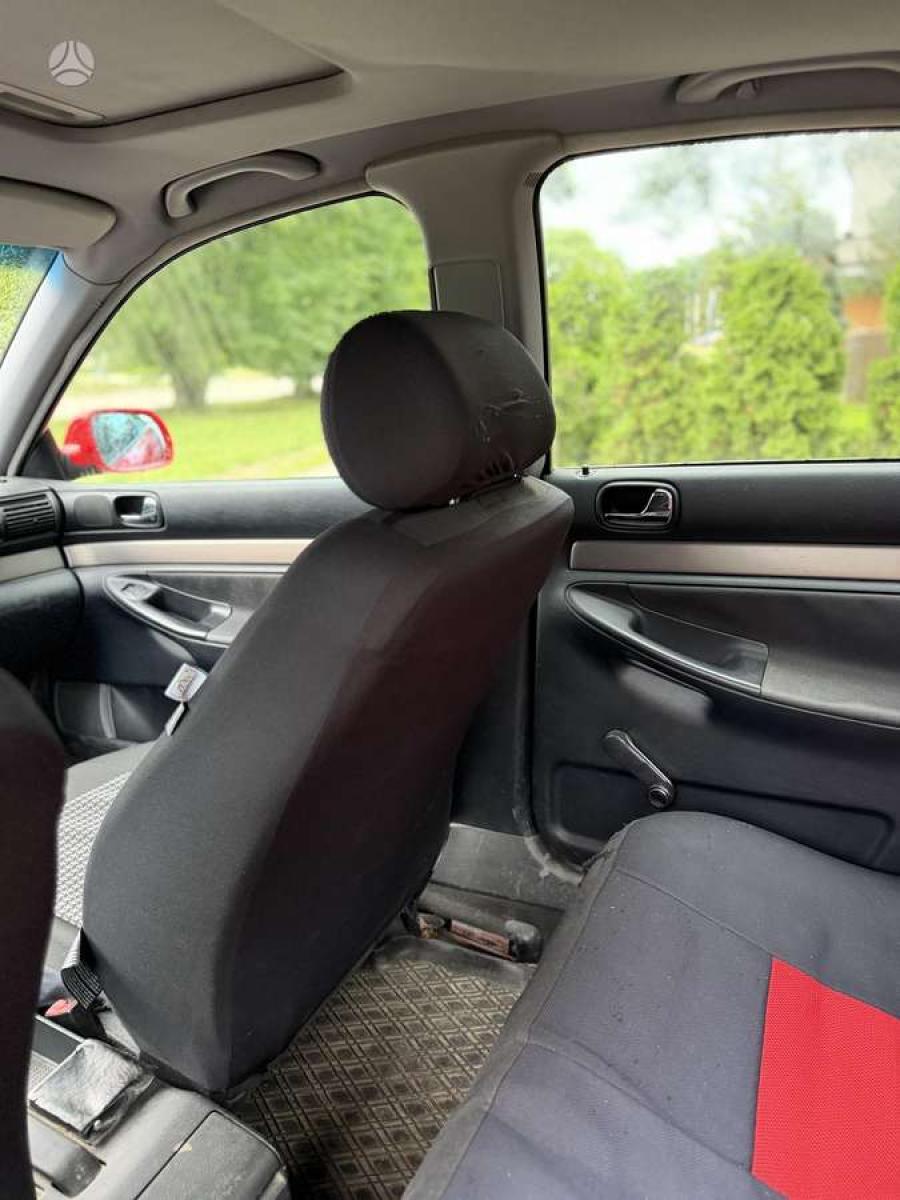 Red Audi A4 1997 in Kaunas, with an engine capacity of 1.60 L and mileage of 271 thousand km for 1100 €, photo 14 on AUTOMOTO.COM.LV