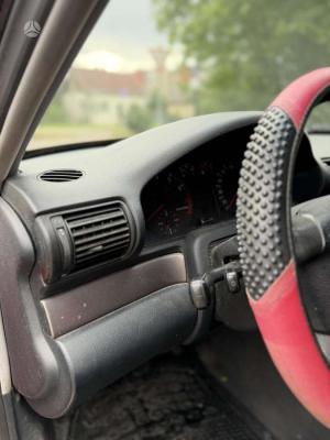 Red Audi A4 1997 in Kaunas, with an engine capacity of 1.60 L and mileage of 271 thousand km for 1100 €, photo 18 on AUTOMOTO.COM.LV