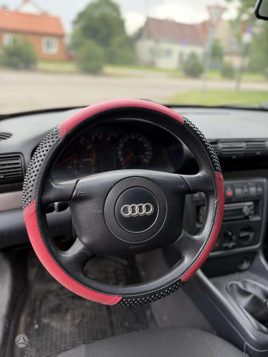 Red Audi A4 1997 in Kaunas, with an engine capacity of 1.60 L and mileage of 271 thousand km for 1100 €, photo 19 on AUTOMOTO.COM.LV