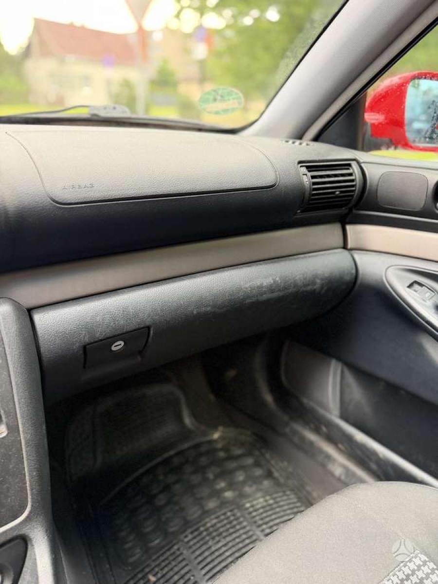 Red Audi A4 1997 in Kaunas, with an engine capacity of 1.60 L and mileage of 271 thousand km for 1100 €, photo 23 on AUTOMOTO.COM.LV